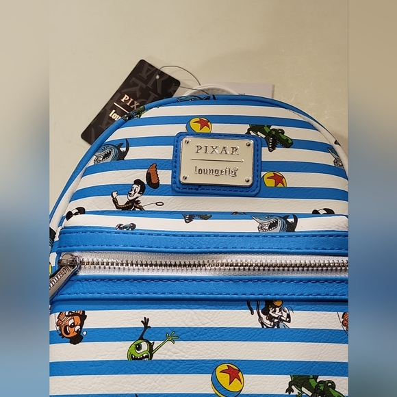 Loungefly | Bags | Loungefly Pixar Backpack | Poshmark